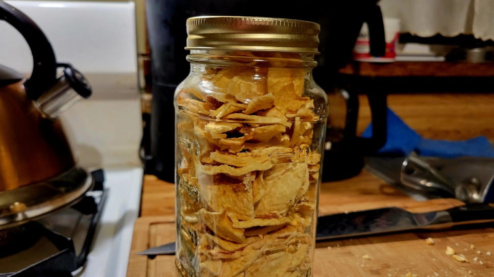 A dozen apples in a jar